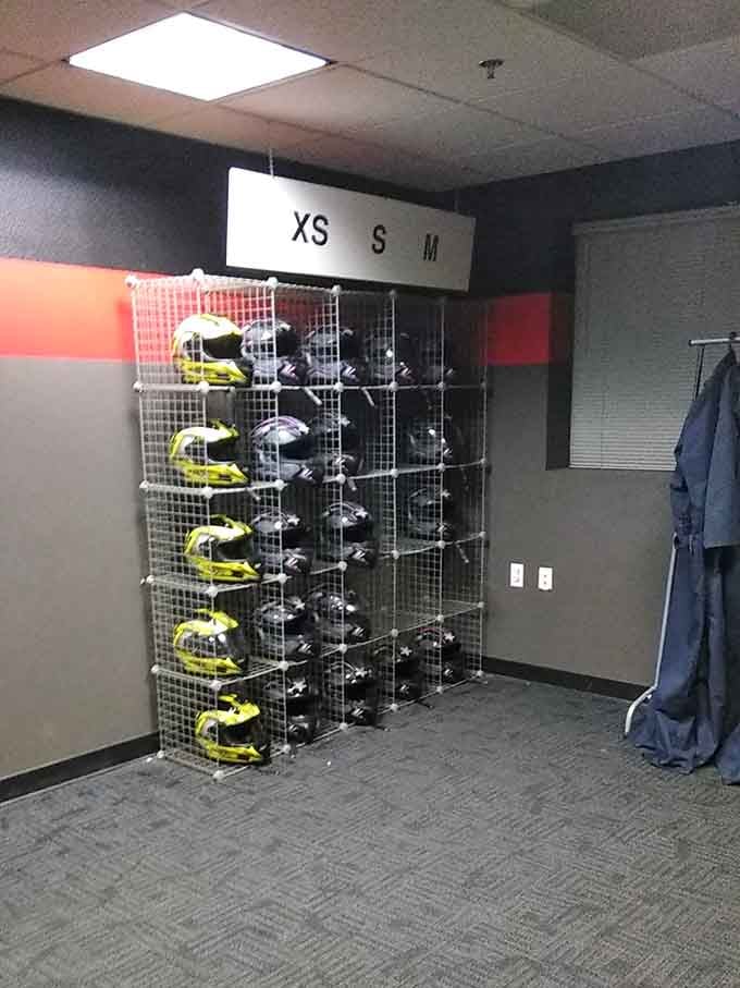 Helmets organized by size, because safety gear should fit properly even when you're chasing childhood dreams at speed.