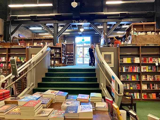 Those stairs lead to more books upstairs, because apparently one level of literary temptation simply wasn't quite enough here.