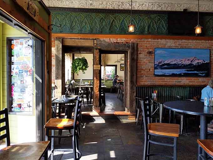 Multiple dining rooms offer intimate spaces where conversations flow as freely as the coffee refills keep coming.