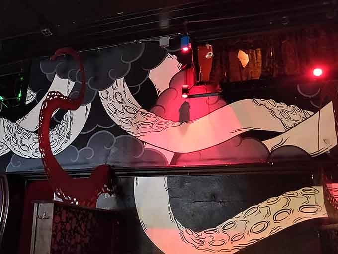 Tentacles and gothic artwork sprawl across surfaces, reminding you that normal bars are overrated and frankly quite boring.