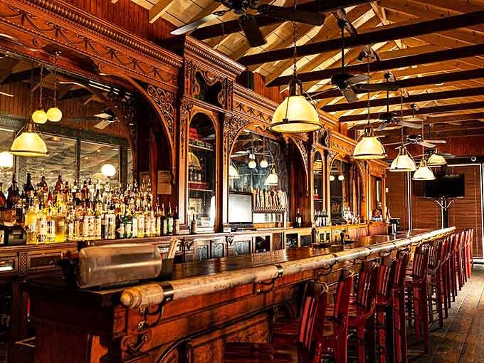 An ornate bar that looks like it was rescued from a much fancier establishment and given a second life.