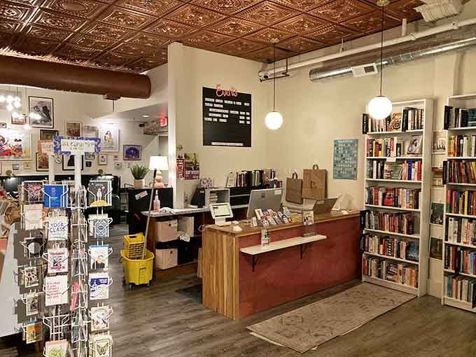 The checkout counter sits ready to ring up your new books and refill your wine glass, truly understanding modern multitasking.