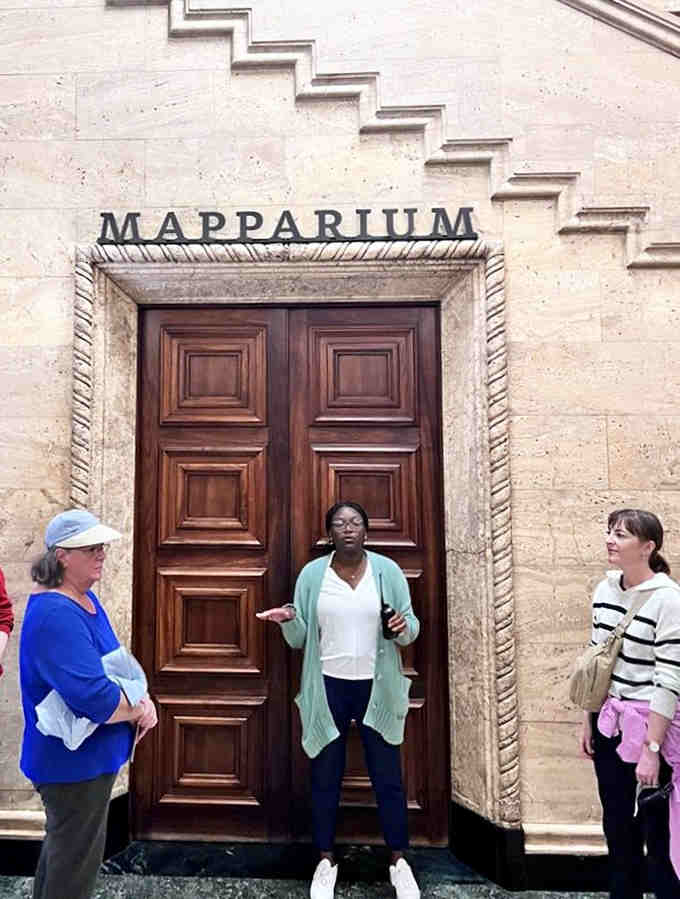 Standing before the entrance, visitors prepare to step into a perspective-shifting experience unlike anything they've encountered before.