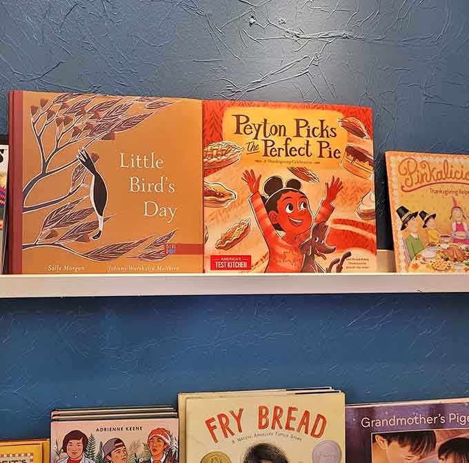 Children's picture books displayed at eye level make it impossible for little ones to resist their colorful covers.