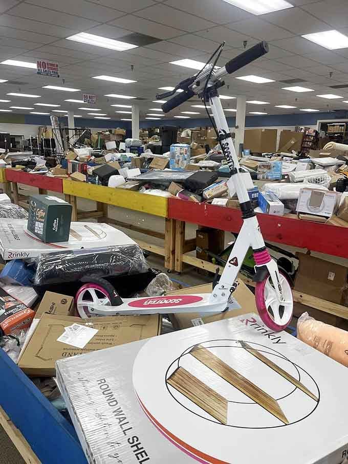 A pink scooter perched among the deals like it's waiting for its next adventure around the neighborhood.