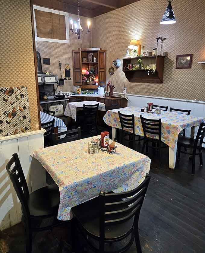 Patterned wallpaper and cozy tables create the kind of dining room where memories are made over meatloaf.
