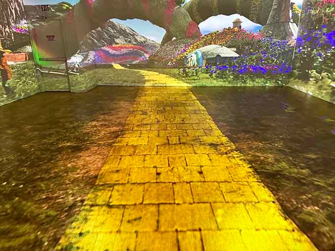 Follow the yellow brick road through projected landscapes that bring the journey to life around you.