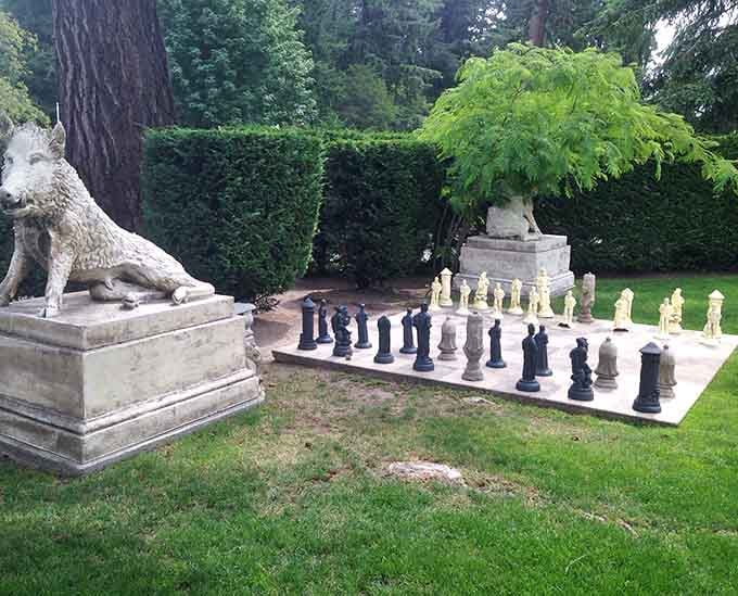Outdoor chess where every move feels monumentally important, even when you're losing spectacularly to your spouse.
