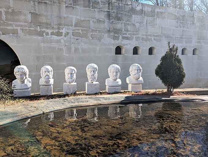 Classical bust sculptures lined up like ancient philosophers debating which Georgia mountain view reigns supreme here.
