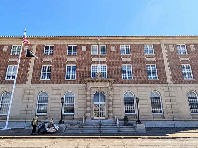 The stately Post Office building stands as a brick-and-mortar reminder that some institutions transcend the digital revolution with dignified persistence.