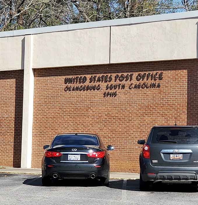 The post office stands as a brick-and-mortar reminder that some communications still require stamps and the satisfying thunk of a mailbox.