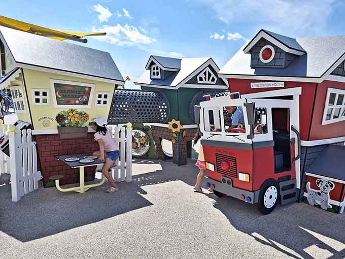 A miniature Main Street where kids run their own shops, learning capitalism one pretend transaction at a time.