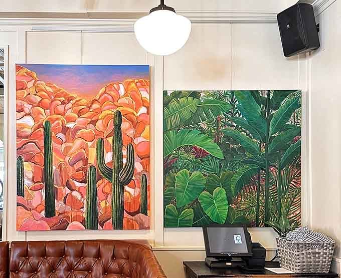 The vibrant wall art transforms ordinary meals into multi-sensory experiences—like dining inside a living gallery where the food matches the creativity.