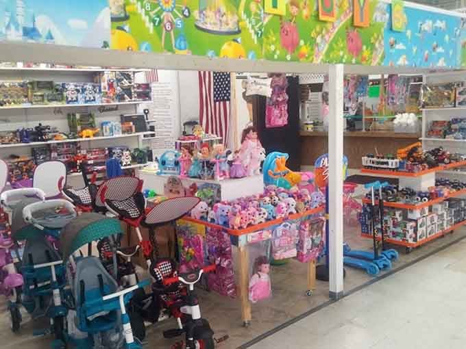 Colorful toys create a carnival atmosphere where childhood dreams meet prices that make parents actually smile for once.
