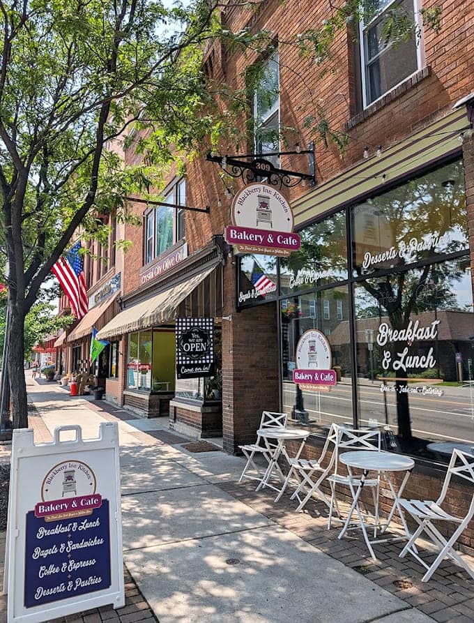 Downtown storefronts serving breakfast and baked goods, because every great adventure needs proper fuel first.