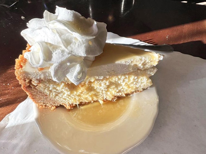 This towering slice of pineapple cheesecake looks like it defies both gravity and any reasonable definition of portion control.