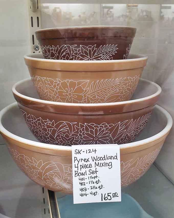 Pyrex Woodland mixing bowls stacked like edible art, the kind grandma used for every holiday feast imaginable.