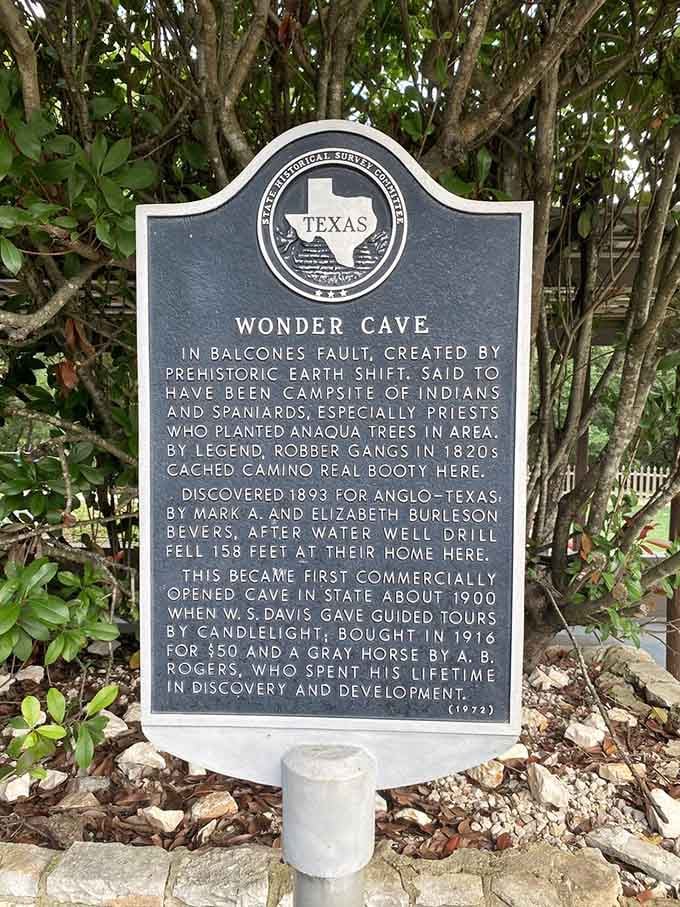 This historical marker tells the cave's story, proving that sometimes the best discoveries happen when you're just drilling for water.