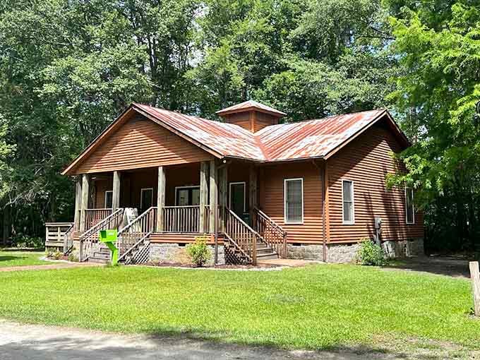 The park's rustic cabin sits ready to host events, proving civilization and wilderness can absolutely coexist.