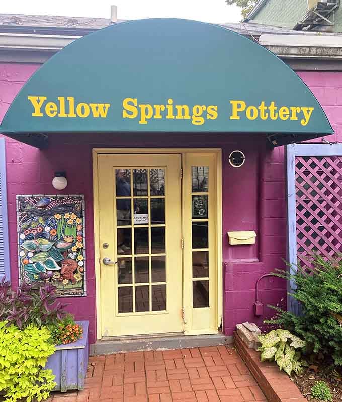 Yellow Springs Pottery's cheerful entrance promises handcrafted treasures that'll make your kitchen shelves infinitely more interesting inside.
