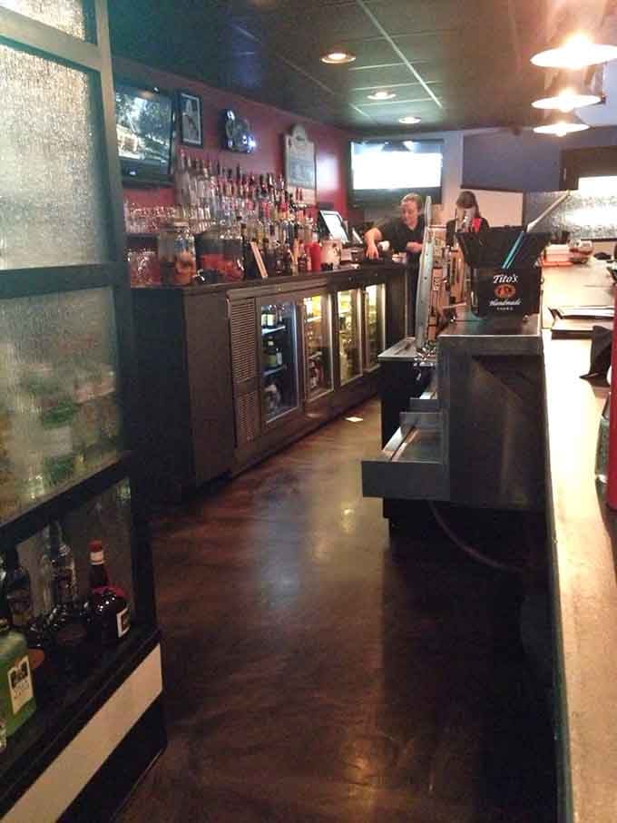 A bar stocked with enough spirits to lift yours. The kind of place where everybody might not know your name yet, but they soon will.