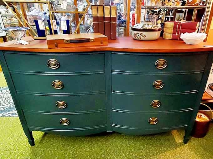 This teal dresser isn't just furniture; it's a statement piece with stories to tell. Someone's going to build an entire room around this beauty.