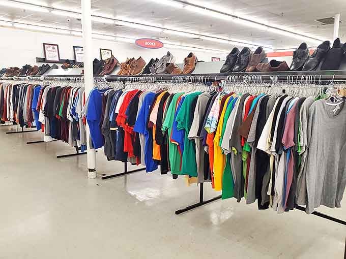Men's clothing organized with military precision. The shirts stand like colorful soldiers, each one hoping to be drafted into your wardrobe rotation.