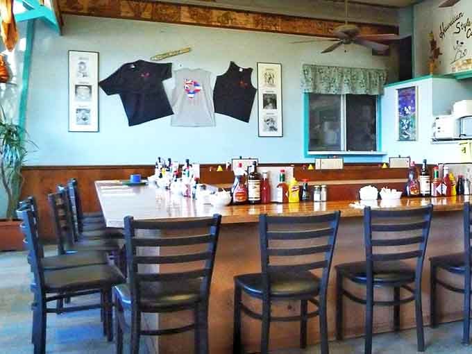 The counter seating offers front-row tickets to the breakfast show, where every plate that passes is another reason to question your ordering decisions.