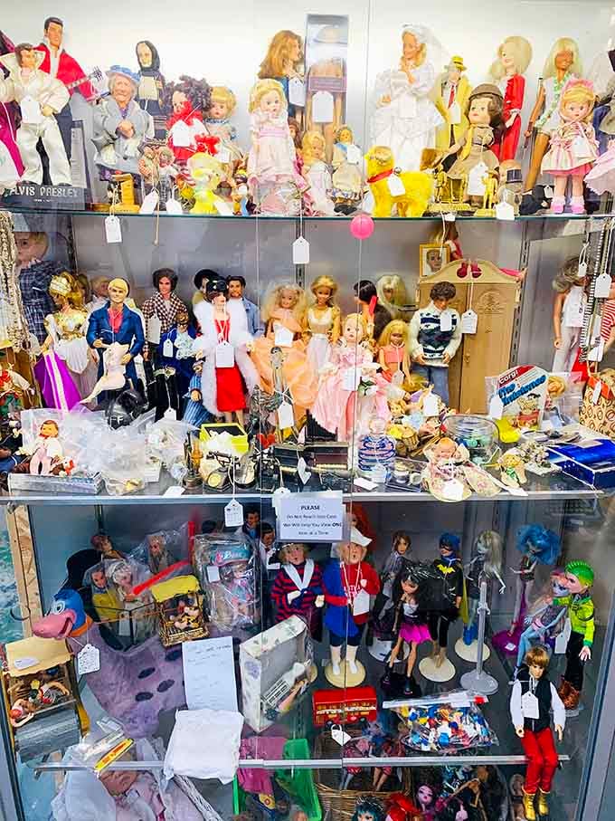 This doll collection spans decades of fashion and pop culture, from Elvis to Barbie's most questionable outfit choices.