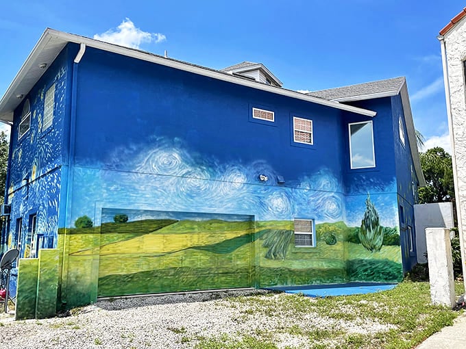 The side view showcases the pastoral elements of Van Gogh's vision&mdash;those rolling green fields providing perfect contrast to the dramatic sky above.