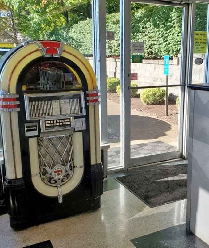 The vintage jukebox stands guard by the entrance, ready to provide the perfect soundtrack to your pancake-flipping, coffee-sipping breakfast symphony.