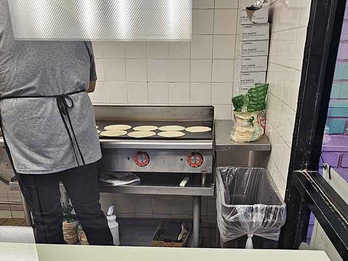 A glimpse into the tortilla-making station – where the foundation of Brothers' reputation is formed, pressed, and cooked to perfection.