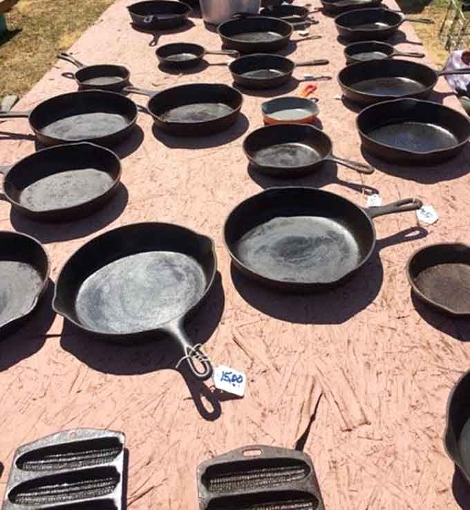 Cast iron heaven! These seasoned skillets have stories to tell—decades of cornbread and country cooking embedded in their well-worn surfaces.