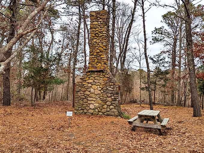 This stone chimney stands as a silent sentinel of picnics past. If it could talk, it would share tales of family gatherings spanning generations.