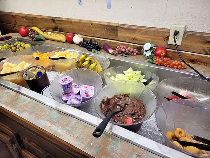 The salad bar offers fresh redemption for those who've indulged elsewhere. These aren't just toppings; they're colorful confessions that healthy can be delicious too.