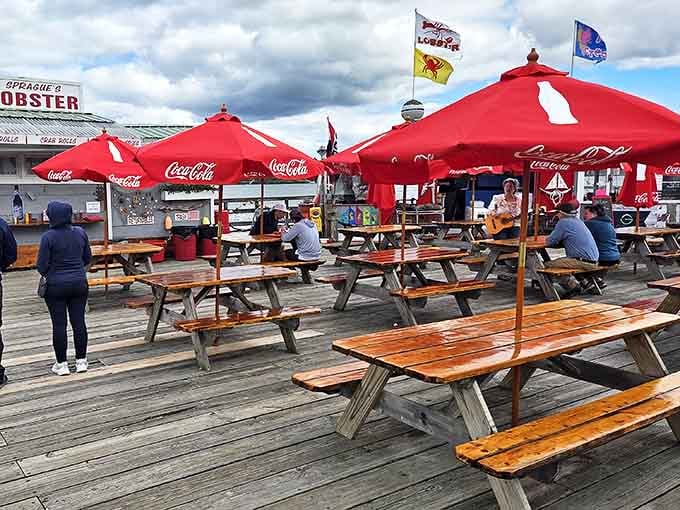Where memories are made between bites. Red umbrellas, weathered picnic tables, and the promise of seafood create the quintessential Maine dining experience.