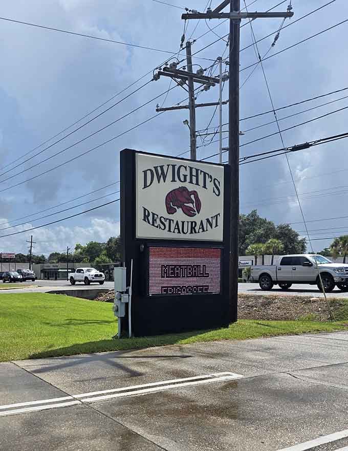 The roadside sign with that iconic crawfish logo tells travelers they've found the real deal&mdash;authentic Cajun cooking awaits inside.
