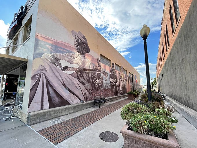 This stunning mural celebrates Navasota's blues heritage, a visual symphony honoring the musical legends who once walked these very streets.