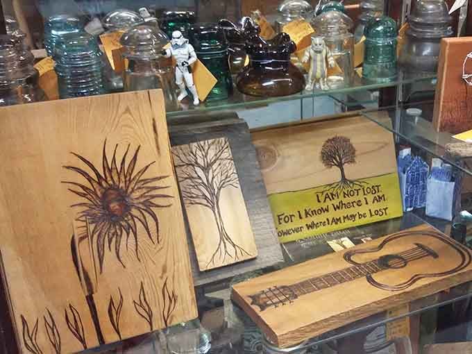 Wooden art pieces whisper philosophical musings&mdash;because nothing says "deep thoughts" like a tree etched into reclaimed barn wood.