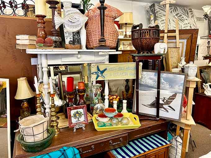 Shelves packed with unique home decor treasures at St. Vincent de Paul Thrift Store which offer everything from wicker baskets to vintage lamps.