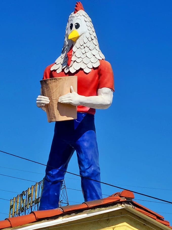 Meet Chicken Boy, the 22-foot-tall fiberglass icon watching over Los Angeles with his friendly chicken grin and bucket.
