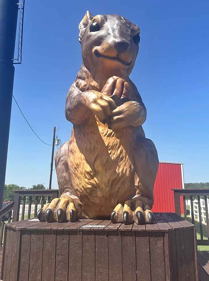 The carved squirrel's detailed features and cheerful expression make this roadside attraction impossible to pass without stopping.
