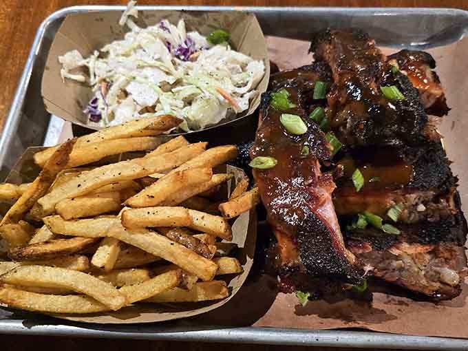 Ribs with fries and slaw prove that the holy trinity of barbecue sides exists and it's available right here.
