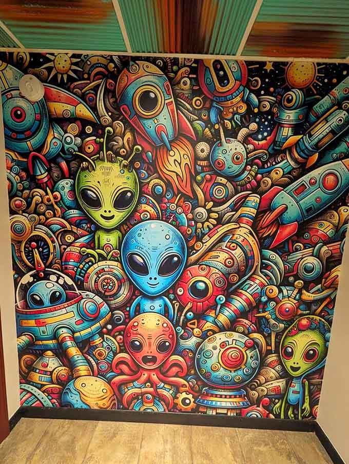 This colorful mural featuring friendly aliens and spaceships is basically Instagram gold waiting to happen here.