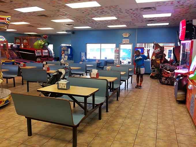Dining tables waiting for tired families to refuel between rounds, where strategy sessions and trash talk happen simultaneously.