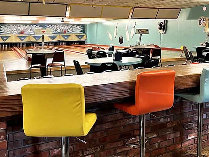 Retro charm lives on at Alley Cats Bowling, where colorful seats and vintage lanes offer a nostalgic escape that's straight out of a midcentury Americana postcard.