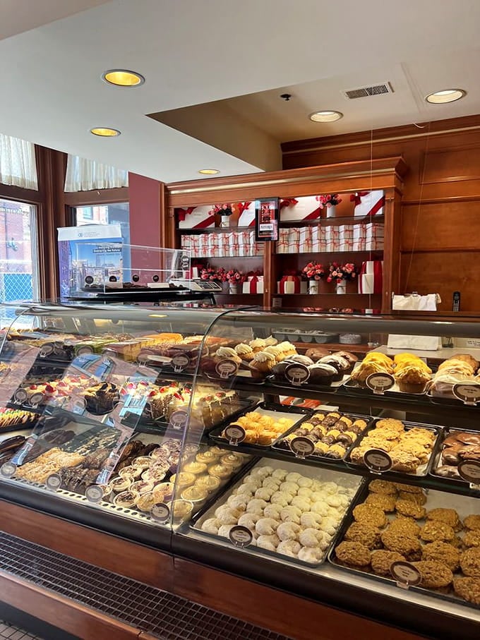Another angle of pastry paradise, where every shelf holds another reason to loosen your belt.