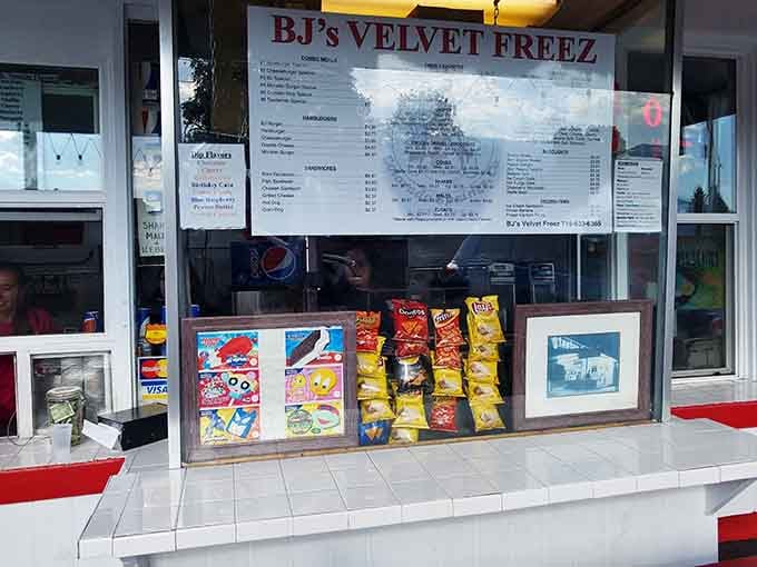 That vintage photo and chip display remind you this place has been making people happy for quite some time.