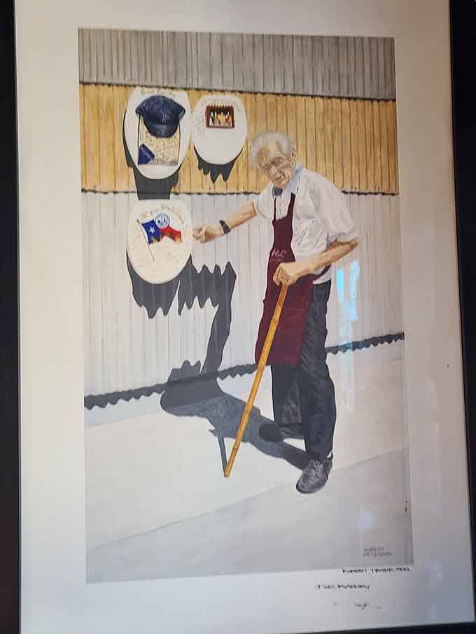 The artist himself, captured in a moment of pride beside his life's work and unusual legacy.