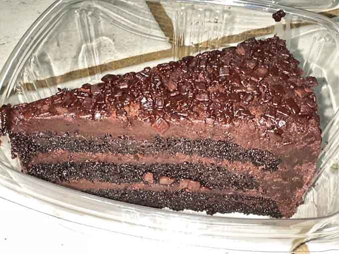 That chocolate cake slice is so decadent it should come with a warning label and possibly a cardiologist's phone number.